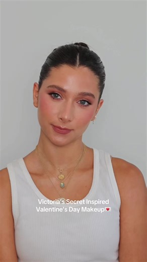 A Victoria’s Secret-inspired look with pink, sparkly eyes and a pink, glowy blush. Perfect for Valentine’s or Galentine’s. Makeup by @makeupbyrheapatel 🤍 Valentine’s Day hair and makeup appointments at Tonic Studio are booking out fast! #valentinesday #victoriasecretmakeup #makeuplook #melbournemakeupartist