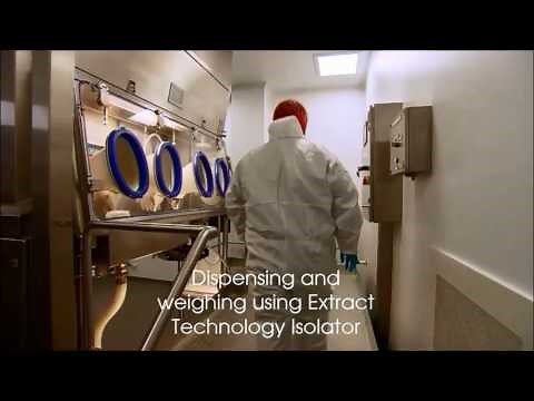 Dispensing API materials safely using a downflow booth and a dispensing isolator