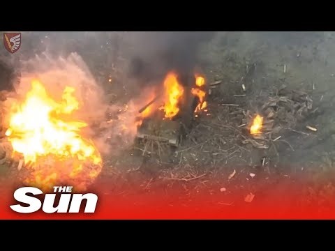 Dramatic moment Russian howitzer bursts into flames after being hit by a Ukrainian brigade