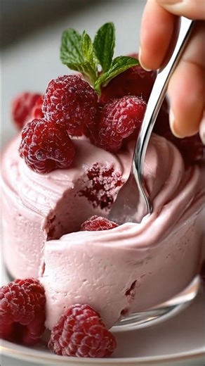 Elegant Raspberry Mousse Ingredients For the Raspberry Mousse 1 cup fresh raspberries (plus extra for garnish) 2 tablespoons granulated sugar (adjust to taste) 1 cup heavy whipping cream 2 tablespoons powdered (icing) sugar 1 teaspoon vanilla extract 1 tablespoon gelatin (optional for firmer texture) A pinch of salt 👩‍🍳 Instructions 1. Prepare the Raspberry Base In a bowl, mash the raspberries with the granulated sugar until well combined. If you want an extra smooth texture, you can puree thi