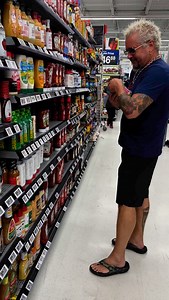 It’s all hands on deck to keep @flavortownusa sauces on the shelves at @walmart!! 😂🔥 | Guy Fieri