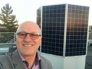 David Dodge with octagonal solar module at Red Deer College