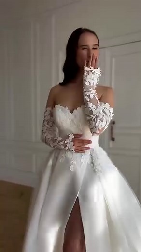 2.5M views · 8.1K reactions | NEW DRESS Yes or No? The A-line lace wedding dress Lilian features a detachable train and detachable sleeves, giving you three outfits in one dress ❤️ Amazing, right? COMING SOON #weddingdresses #convertibleweddingdress #alineweddingdress #laceweddinggown #convertibleweddingoutfit #oliviabottega | Olivia Bottega Dresses | Facebook