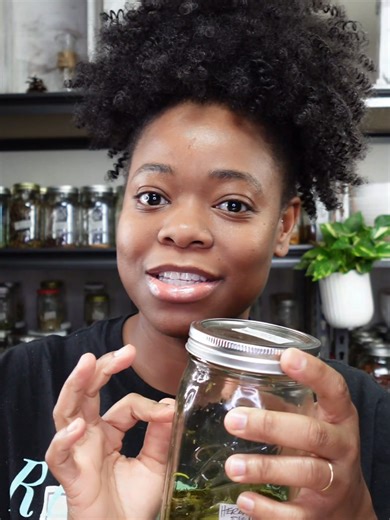 This is my bath water decoction method a slow water-bath extraction that pulls minerals, volatile oils, and deep plant compounds without shocking or damaging the herbs. I place my herbs inside a heat-safe glass jar and cover them with room temperature water. That jar then goes into a pot of room temperature water. Everything heats up together slowly and evenly. Here’s what you do not do: • Do not place a cold jar into already hot water the thermal shock can crack the glass and stress the herbs. 