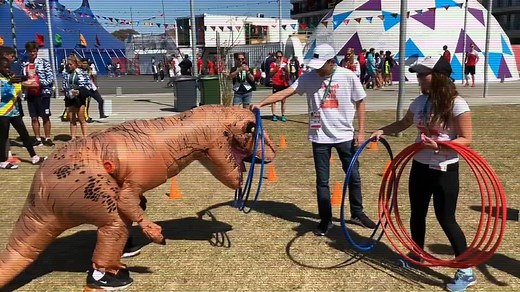 Hula hooping seems easy until you have a giant inflatable dinosaur costume on. #gamechangers #yog