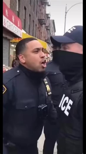 kind NY police officer stands up to evil ICE agent #mask #psycho #ice #lawenforcement #newyork