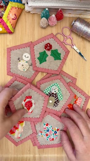 If you love sewing festive decor, my next quilt-as-you-go pattern will be right up your alley. It is dual-purpose with multiple technique options. Sew Hollygon Wreath now and finish it in time for Chrismtas! Which motif is your favorite? * Tree * Gingerbread man * Ornament * Holly * Snowman * Dove * Bow * Gingerbread house * Snowglobe * Stocking The pattern is available! https://craftapalooza.com/products/hollygon-wreath-pattern #quiltasyougo #handsewn #applique #christmassewing #craftapaloozade