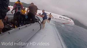 U.S. Navy Sailors assigned to Underwater Construction Team 2 conducting a sweep of Air Nuigini flight PX56 after it crashed in Chuuk Lagoon. Sailors are shown walking on the planes wing and inspecting the interior of the plane for passengers and crew have been evacuated. | World military HD videos