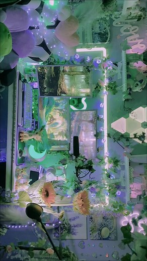 Cozy Green and Purple Desk Setup with Plants and Sunflowers