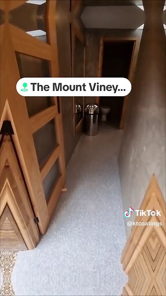 Micro cement with a raw texture on walls and much more... In this stage, installation microcememt gives to walls a stunning industrial look of freshly poured concrete look. We can choose from several modern concrete colours and styles. The Mount Vineyard new promises with custom walls and spray granite effect on floors. #creative #renovation #ideas #design #antislipary #microcement #retail #topcoat #epoxy #spraygranite #infinity