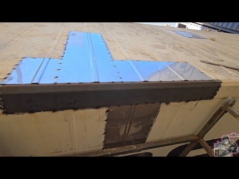 Welded patch and top rail section. Refrigerated shipping container repair.
