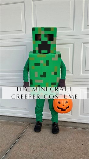 The Interior Reframe | Stephanie | Budget DIY + Design on Instagram: "My mom always made our Halloween costumes when I was little and I love that I can continue the tradition 🧡 I know I could easily buy a creeper costume but this was so fun to make! At first, I made a grid to paint the squares and it was taking forever. I decided to freehand them and it went so much faster! . #minecraft #creeper #diyminecraftcostume #creepercostume #diyhalloweencostume #kidscostumes"