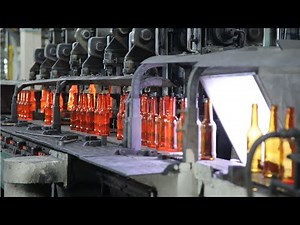Making glass bottles by IS machines