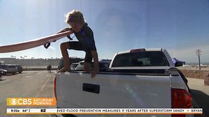 18K views · 641 reactions | It takes years of practice, and often failure, for a surfer to master the sport. Finding the connection between body and board while standing on a surge of water is challenging enough to acquire,but it's even harder to teach others how to do it. One young surfer is sharing what he learned to help other kids ride waves. | CBS Mornings | Facebook