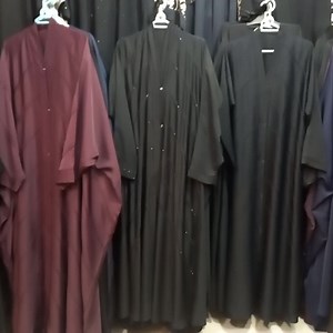 Nida pentex design abayas kaftan with stole Price: Rs. 2900/- front open stonework with stole Price: Rs. 2900/- front open simple without stole Price: Rs. 2400/- Cash on delivery all over Pakistan To place an order, Please inbox us or Whatsapp 03465040696 / Call 03365052508 | Abaya and Hijab Collection