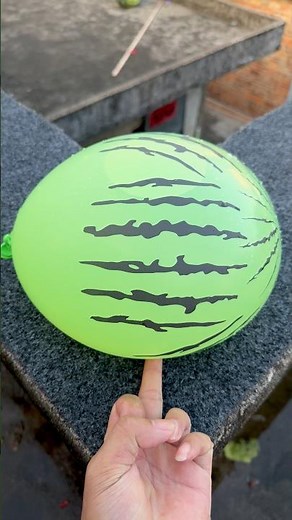 Experiment: Will a water balloon explode if it rolls down a tall building? 💥🎈 #balloon
