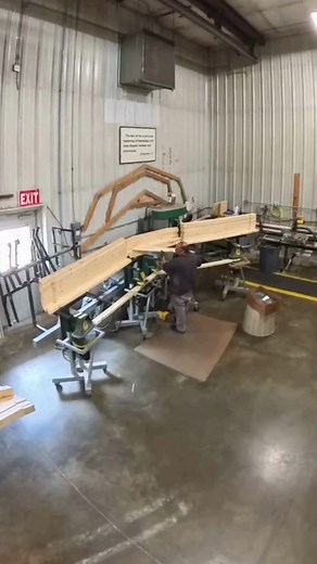 See how trusses come together with the help of precision machinery. Built strong, consistent, and reliable — the backbone of every sturdy building. | Dakota Storage Buildings
