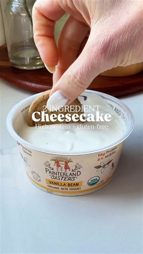 The viral 2-ingredient cheesecake yogurt is worth the hype! ✨ Comment “recipe” and I’ll send you the full recipe. Here’s how I made mine: • 1 small container full-fat vanilla Greek yogurt (I used @painterlandsisters) • 1 1/2 Sweet Loren’s cinnamon breakfast cookies Cut cookies into smaller pieces. Gently press the cookies into the yogurt so they’re mostly submerged, leaving a little space between each one so there’s yogurt in between. Refrigerate for at least 5 hours or overnight to let the cook