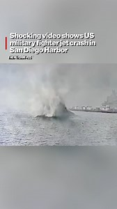 Shocking video shows the US military fighter jet that crashed in San Diego Harbor Wednesday smack into the water and explode moments after both pilots ejected to safety. | New York Post Video