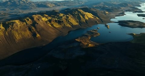 clip-3997990557-golden-hour-drone-flyover-iceland-highlands-lagoon-beside