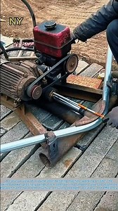 Close Up of a Steel Bending Machine Forming Perfect Arch Frames.