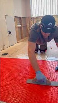 Installing the uncoupling membrane in the master bathroom