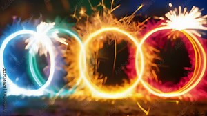 Slow motion light trails as sparklers are captured in all their colorful glory creating a mesmerizing slow dance of colors.