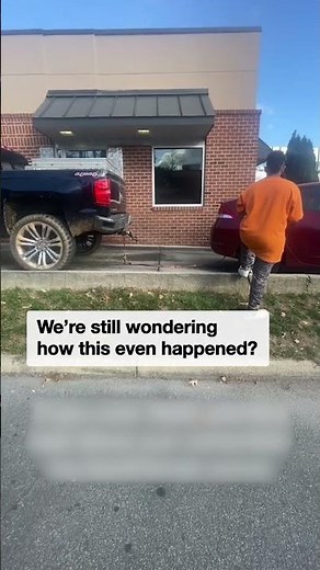 Strangers help rescue motorist stuck on drive-thru kerb