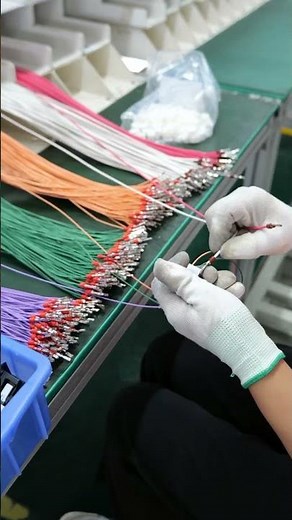 The assembly process of automotive wiring harness.