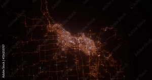 Thunder Bay (Canada) top view at night. View on modern city from satellite. Camera is zooming in, rotating counterclockwise. Vertical video. The north is on the left side