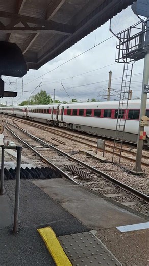 LNER azuma class 801 passing through Hitchin Station with Couple open at the front