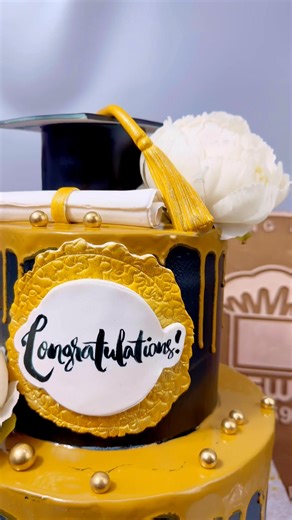 Congratulations to the Class of 2025! 🎓 To mark this special occasion, BBS Sweets has crafted a stunning two-tier graduation cake that's as delightful to look at as it is to taste. The top tier is adorned with a charming graduation cap and diploma decorations, while the bottom tier features an elegant design personalized with your school colors and a heartfelt "Congratulations Graduates!" message. This cake is not just a dessert; it's a centerpiece that celebrates your hard work, dedication, an