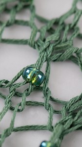 Are you a "slipper" or a "pincher" when you place beads? Itbe Shawl has an exclusive chonky tutorial that is linked in the pattern... and here's a little snippet with two ways to handle your stitch when you are placing a bead with a crochet hook! Kits for Itbe Shawl are restocked in the shop (and so are travel beading kits... I know a few of you have been coveting those!) #nelkindesigns #knittingwithbeads #putabeadonit #summerknitting #summershawl #summerknit #knittingtechniques #knittingtool #k