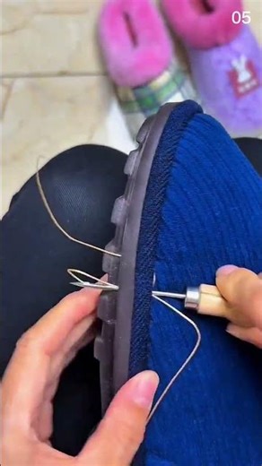 Awl pierces, thread pulls—sole binds to fabric in the quiet stitch of repair and resolve