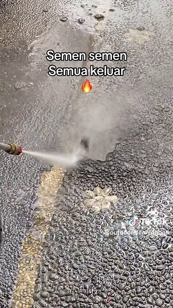 Motorcycle Wheel Cleaning with High-Pressure Hose