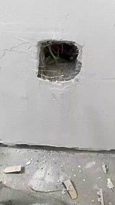 Scraping Plaster Around Switchboard Hole #WallPatch #DIYFix #CleanUp | YNP Media