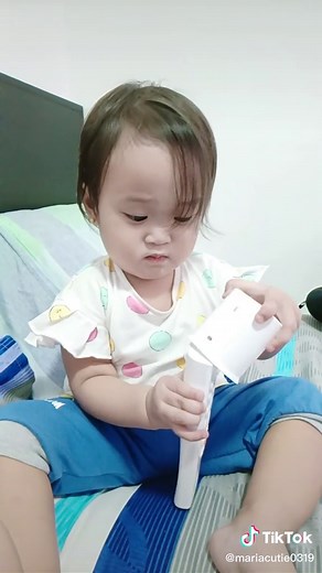 Toddler's Playtime: Exploring a Remote Control