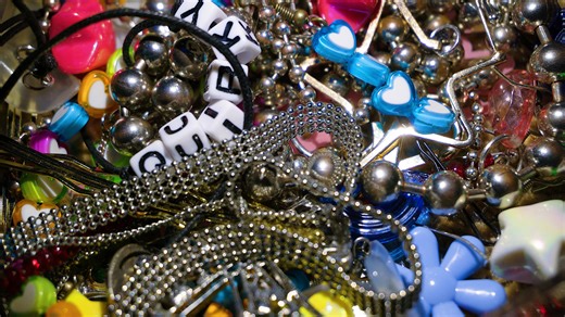 Turn A Dollar Tree Splatter Screen Into A Chic Way To Keep Jewelry Organized - House Digest