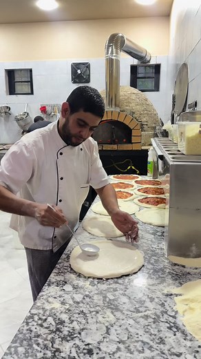 Making Delicious Pizza in a Professional Kitchen
