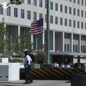 Flags were lowered to half-staff at the State Department to mark the passing of former Army general and Secretary of State Colin Powell, who died Monday of complications from COVID-19. | CBS Evening News