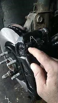 How To : 2013 Ford Flex front brake pad rattle clip