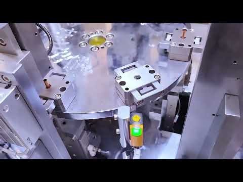 The high efficiency and precision automatic crown spring connector assembly machine