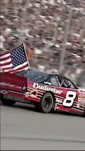Dale Earnhardt, Jr. collects the American and checkered flag in winning an emotional 2001 MBNA 400