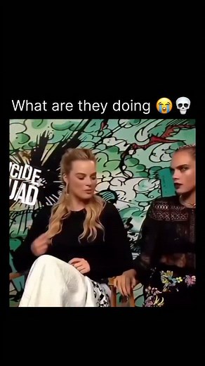Celeb updates on Instagram: "During a promotional interview for the film Suicide Squad, against a vibrant comic-style backdrop, Cara Delevingne and Margot Robbie engaged in a funny and unconventional moment. Delevingne claimed to have a “nipple detector,” meaning she could accurately locate nipples through clothing merely by looking. Robbie challenged her to prove it, and Delevingne proceeded to point to where she believed Robbie’s nipple was. Robbie confirmed she was “millimetres away”. Delevin