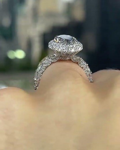 A Masterpiece of Light: Oval Halo Engagement Ring with Pave Setting