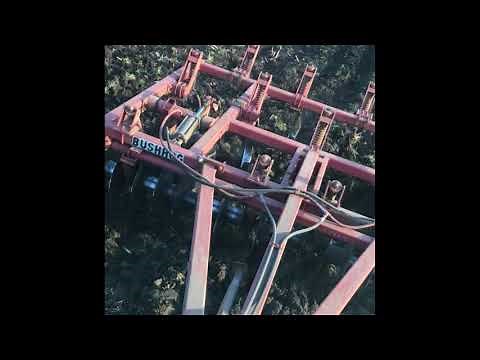 running the disk chisel and soil finisher in the corn field