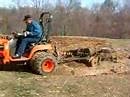 Kubota BX2200 Discing with duals