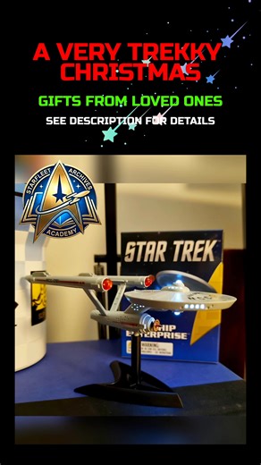 𝗔 𝗩𝗘𝗥𝗬 𝗧𝗥𝗘𝗞𝗞𝗬 𝗖𝗛𝗥𝗜𝗦𝗧𝗠𝗔𝗦 — 𝗚𝗜𝗙𝗧𝗦 𝗙𝗥𝗢𝗠 𝗟𝗢𝗩𝗘𝗗 𝗢𝗡𝗘𝗦 𝘞𝘩𝘦𝘯 𝘺𝘰𝘶𝘳 𝘧𝘢𝘮𝘪𝘭𝘺 𝘶𝘯𝘥𝘦𝘳𝘴𝘵𝘢𝘯𝘥𝘴 𝘵𝘩𝘦 𝘚𝘵𝘢𝘳𝘧𝘭𝘦𝘦𝘵 𝘢𝘴𝘴𝘪𝘨𝘯𝘮𝘦𝘯𝘵. Logdate 2025.12.28. A resupply shuttle docks at Codex Nexus HQ, delivering a payload tuned perfectly to a lifelong #StarTrek archivist. An illuminated #USSEnterprise #NCC1701 desktop model brings the original Constitution-class silhouette to life, while authentic 35mm film cells cut from #StarTrekTheMotionPictu