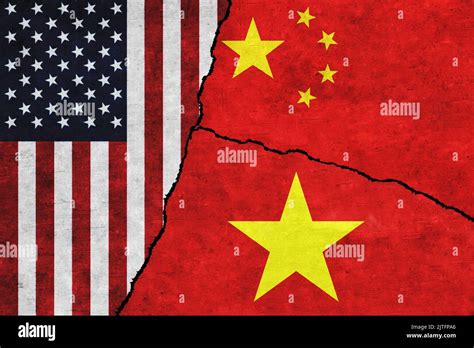 USA Vietnam And China Painted Flags On A Wall With A Crack United