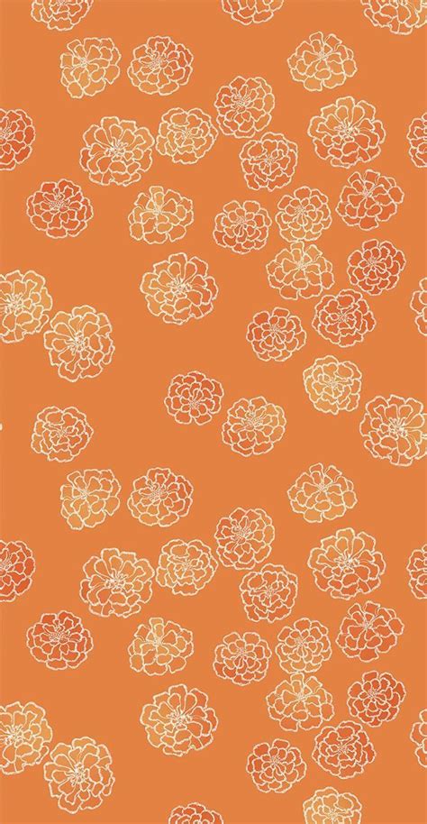 An Orange Background With White Flowers On It